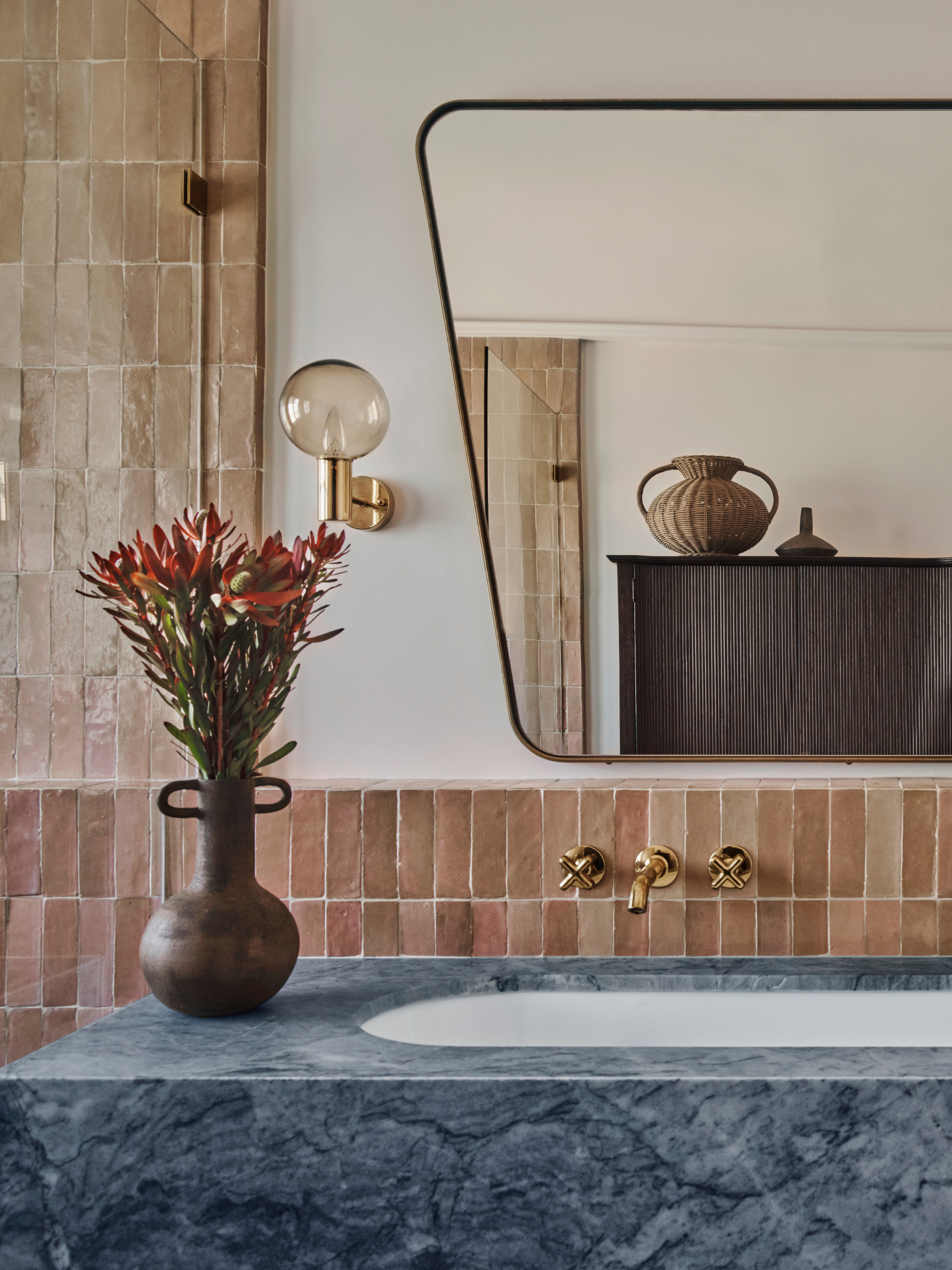 An Elegant His & Hers Bathroom with Riad Tile